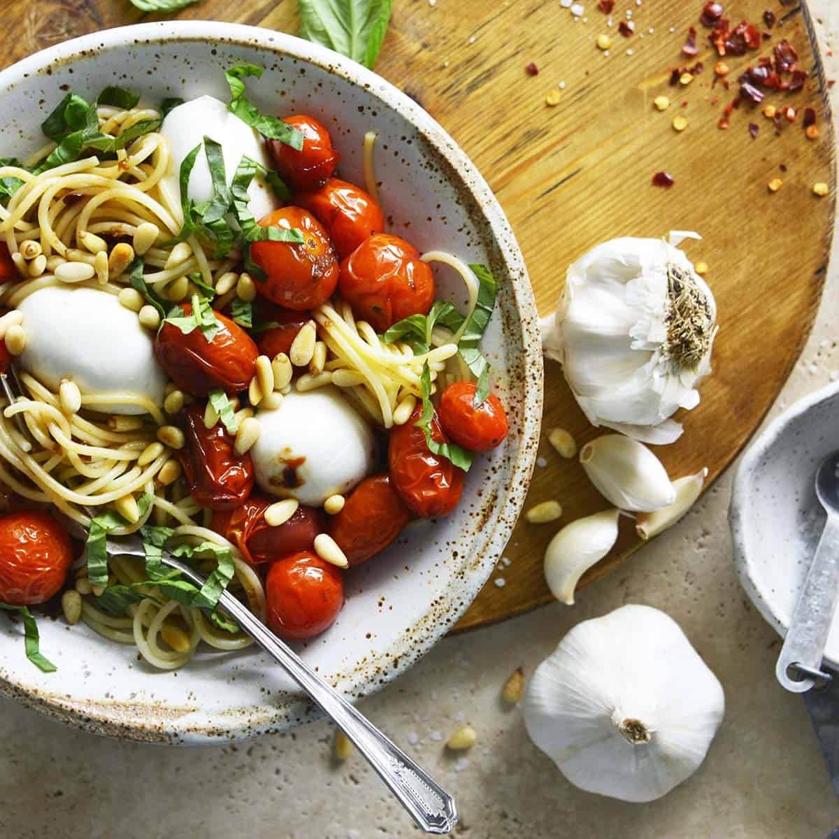 Easy Oven Roasted Tomatoes Recipe with Pasta, Pine Nuts, and Mozzarella ...