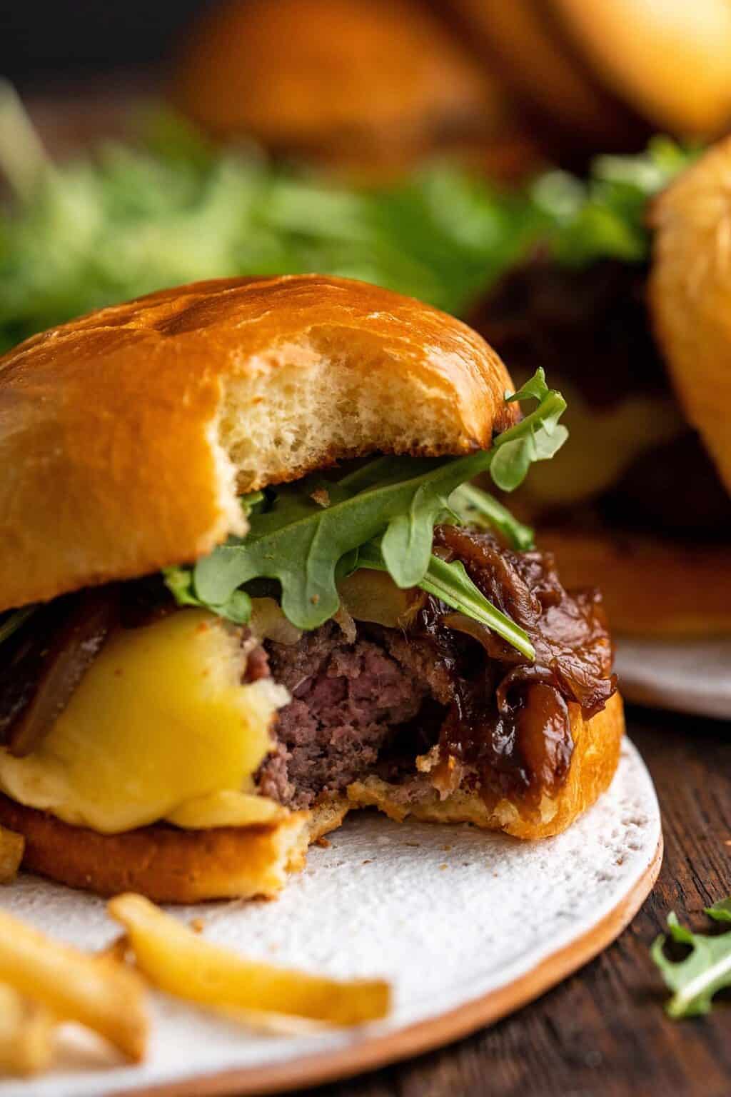 Easy Caramelized Onion Burgers with Swiss Cheese and Arugula